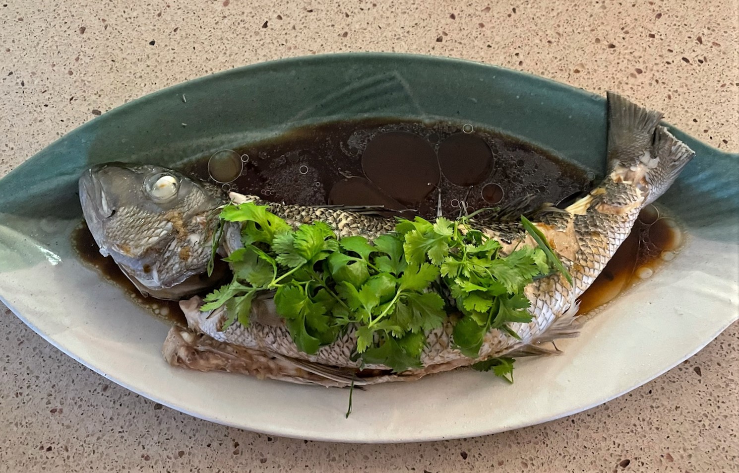 steamed-uku-on-fish-shaped-platter